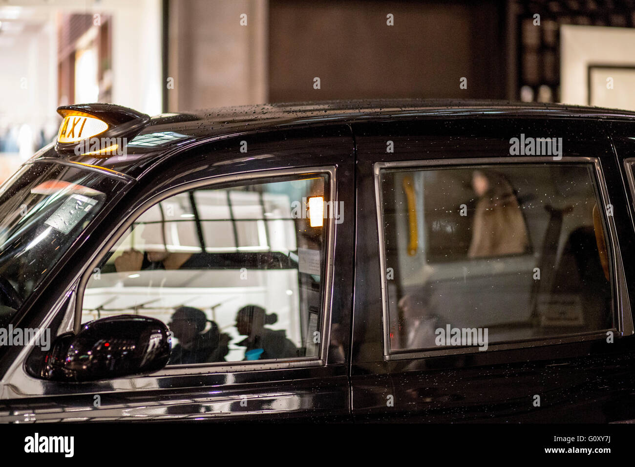 taxi black cab window for hire Stock Photo - Alamy