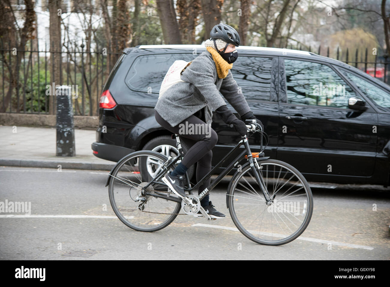 Cyclist cycling commuter pedal bike ride to work Stock Photo - Alamy