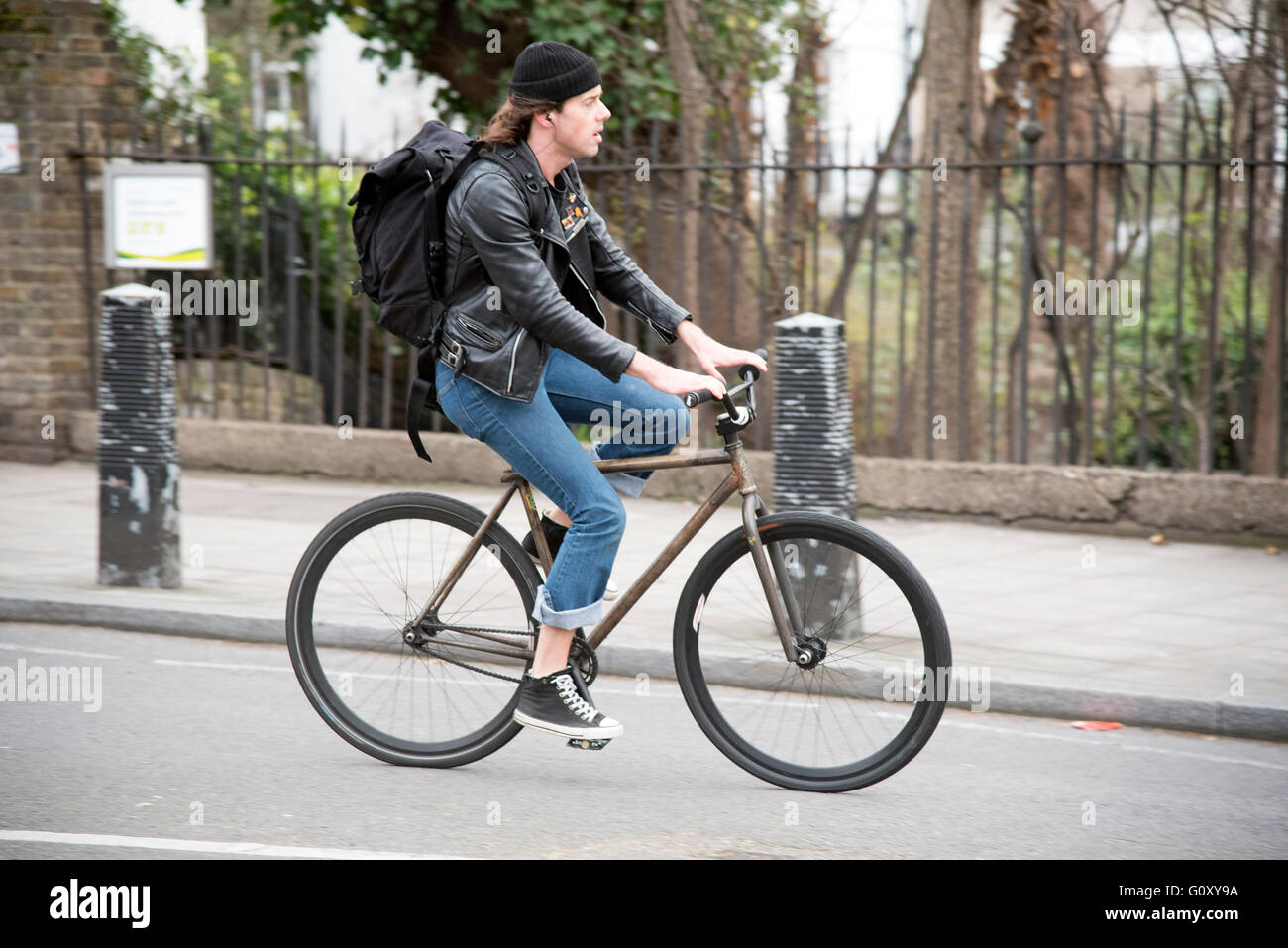 Cyclist cycling commuter pedal bike ride to work Stock Photo - Alamy