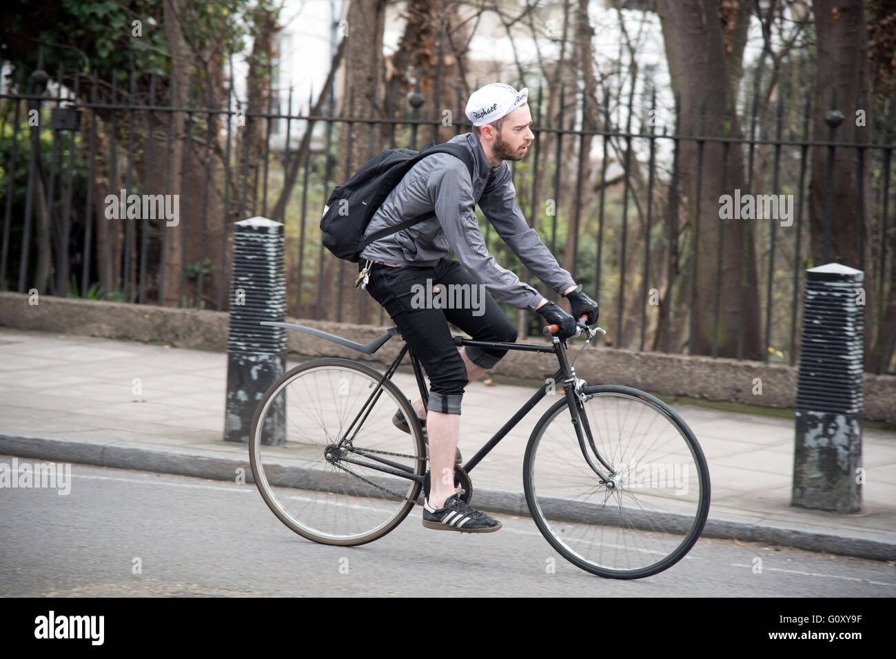 Cyclist cycling commuter pedal bike ride to work Stock Photo - Alamy