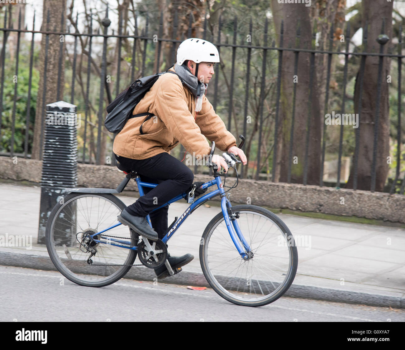 Bike commuter with helmet hi-res stock photography and images - Alamy