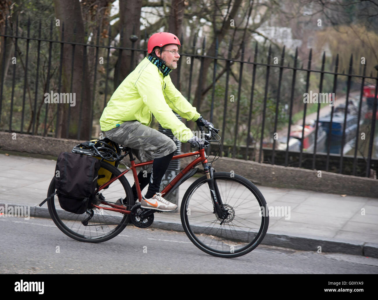 Cyclist cycling commuter pedal bike ride to work Stock Photo - Alamy