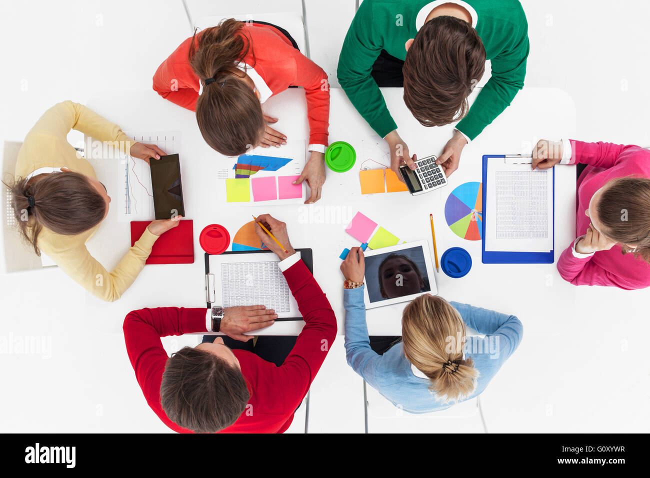 Business people working around table hi-res stock photography and ...