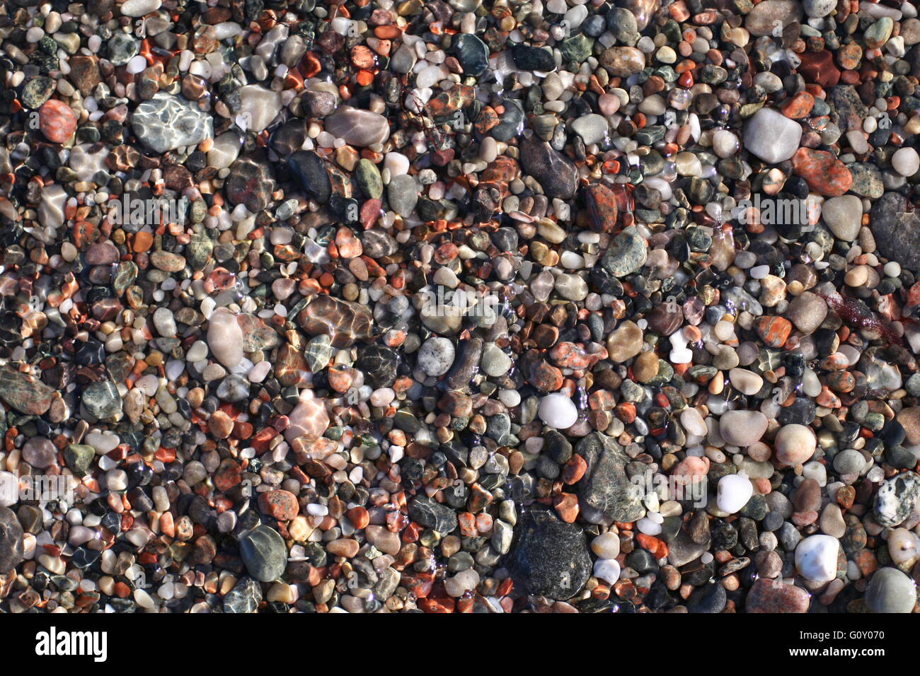 Pebble covered beach on Iona, Inner Hebrides, Scotland Stock Photo - Alamy