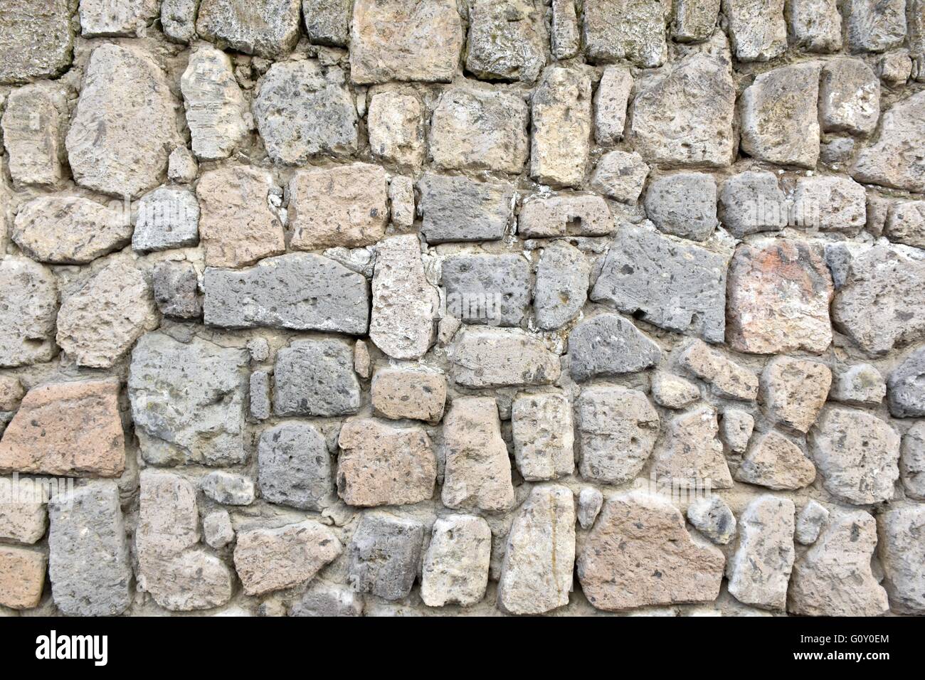 Brick wall with layered design pattern Stock Photo - Alamy