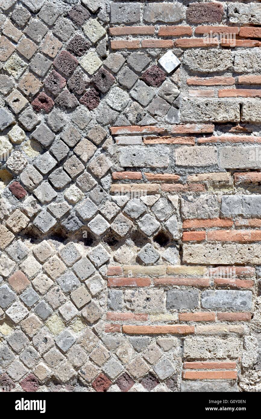Brick wall with layered design pattern Stock Photo - Alamy