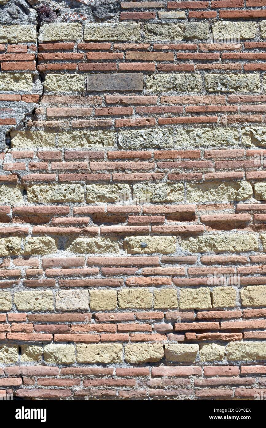 Brick wall with layered design pattern Stock Photo - Alamy