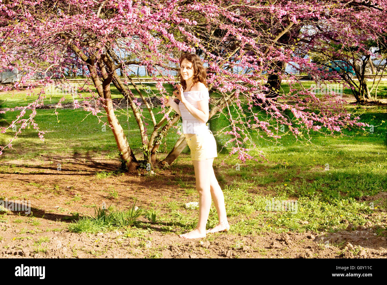 Young european woman stands hi-res stock photography and images - Alamy