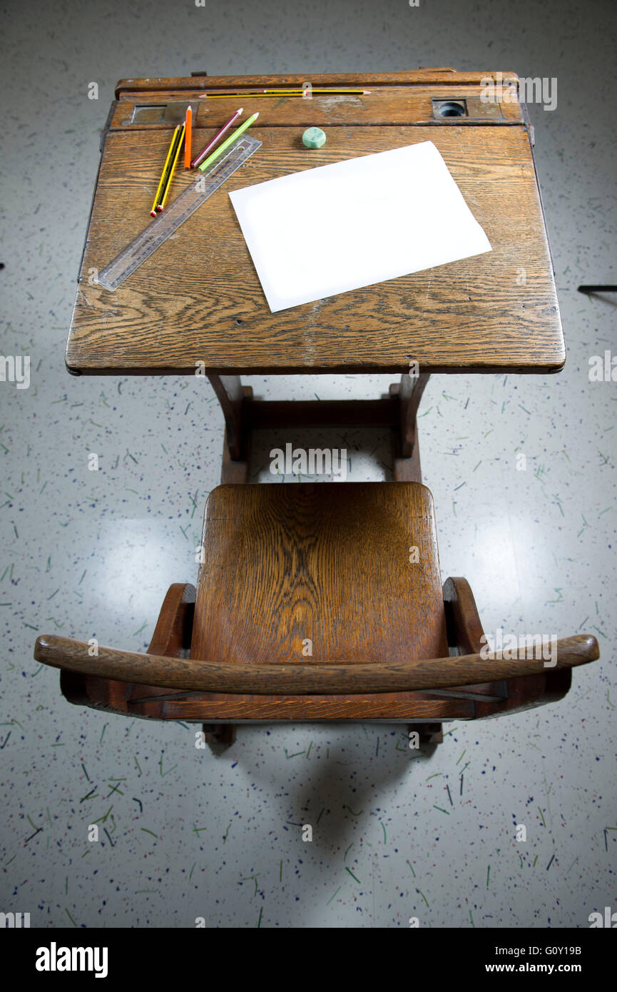 Old wooden school desk for examinations in school Stock Photo - Alamy