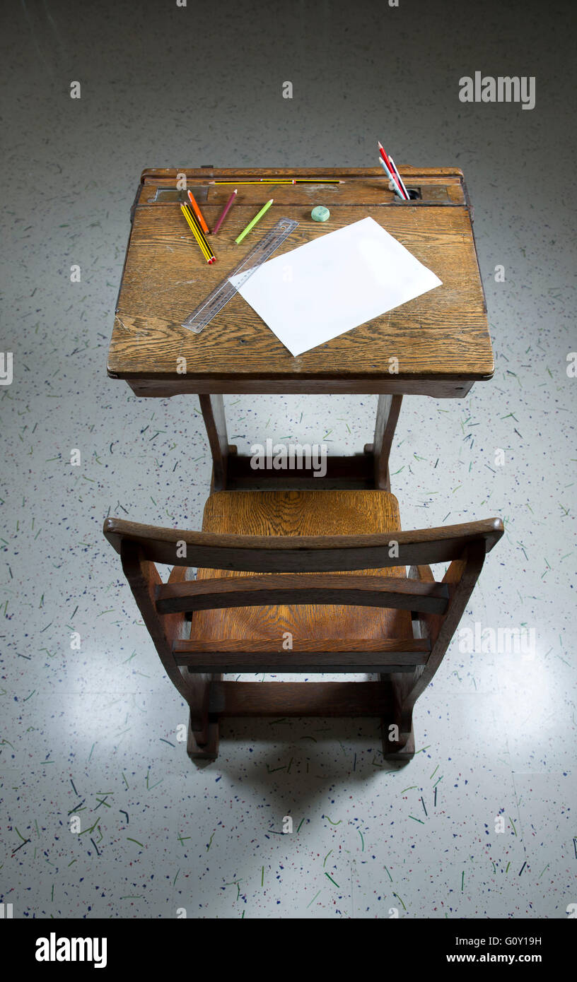 Old wooden school exam desk ready for a student to sit an exam Stock ...