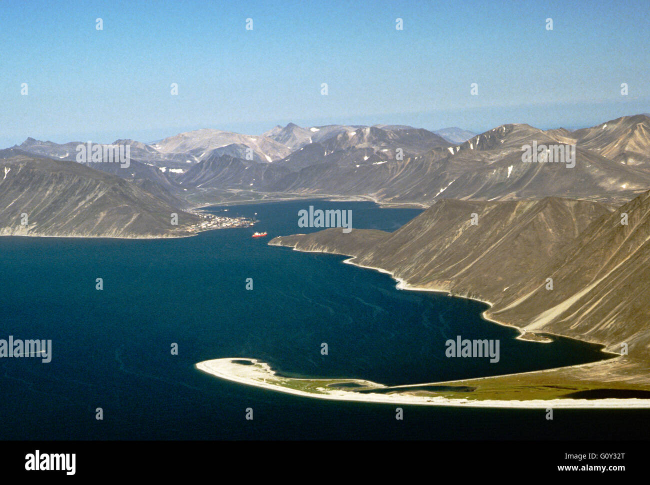 Aerial of lush arctic tundra & Bering Sea coast between Provideniya ...