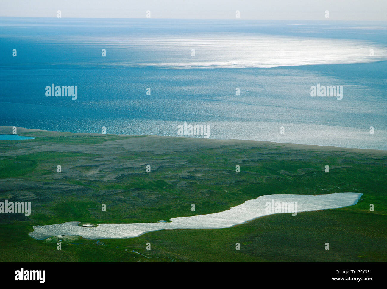 Aerial view inland lake & Bering Sea; between Provideniya & Egvekinot ...
