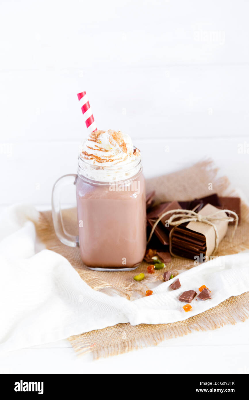 Chocolate milkshake and stack of chocolate Stock Photo - Alamy