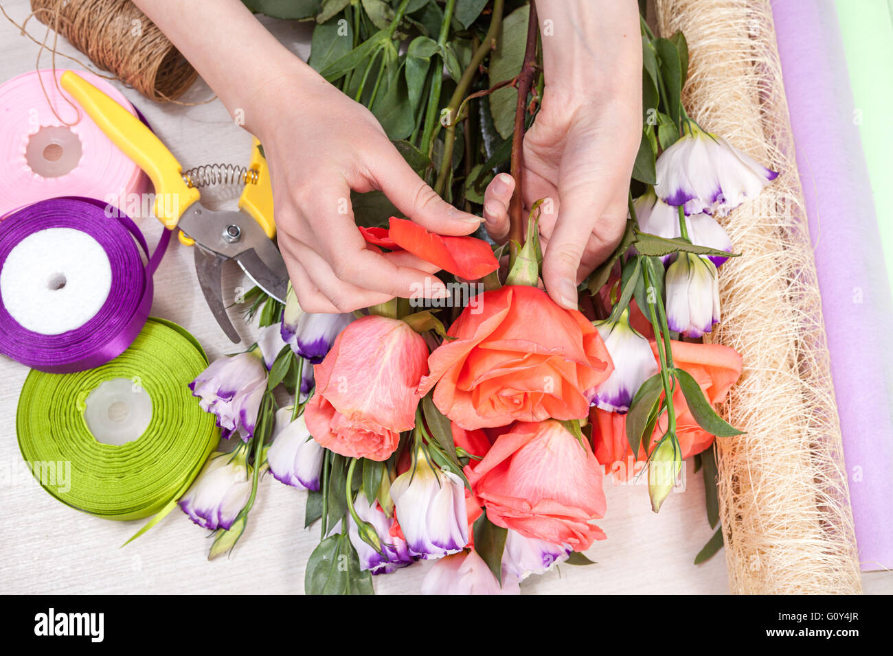 Florist at work with flowers Stock Photo - Alamy