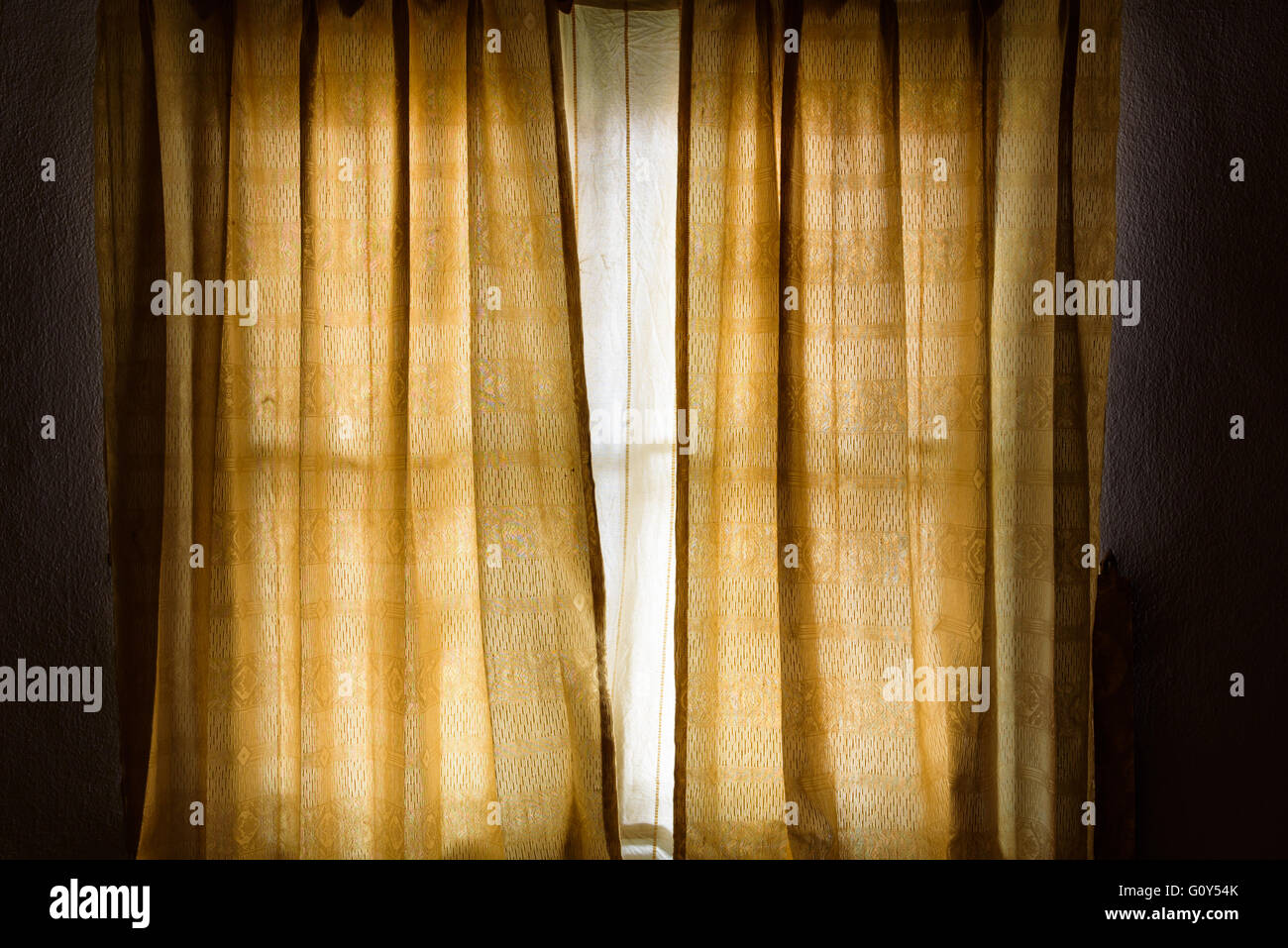 Vintage gold curtain background in home Stock Photo - Alamy