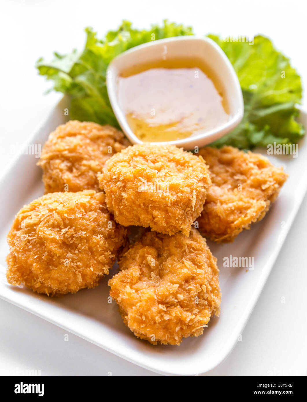 deep-fried shrimp cakes with sweet sauce on white background Stock ...