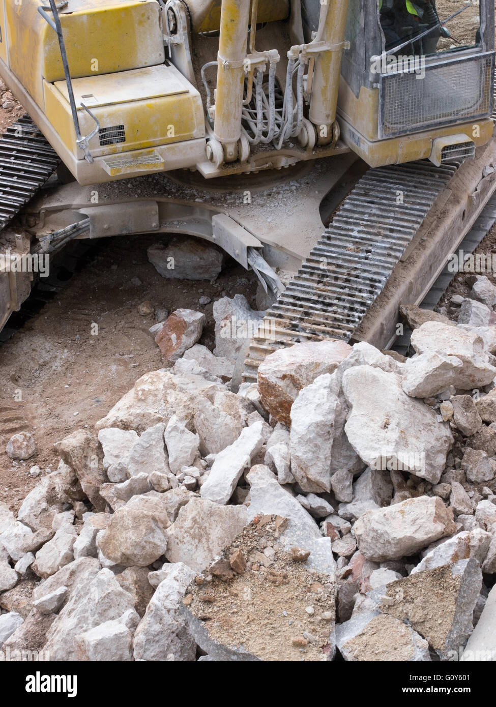 Excavator close up on construction site Stock Photo - Alamy