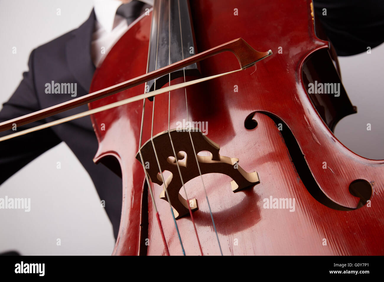 young man with a cello Stock Photo - Alamy