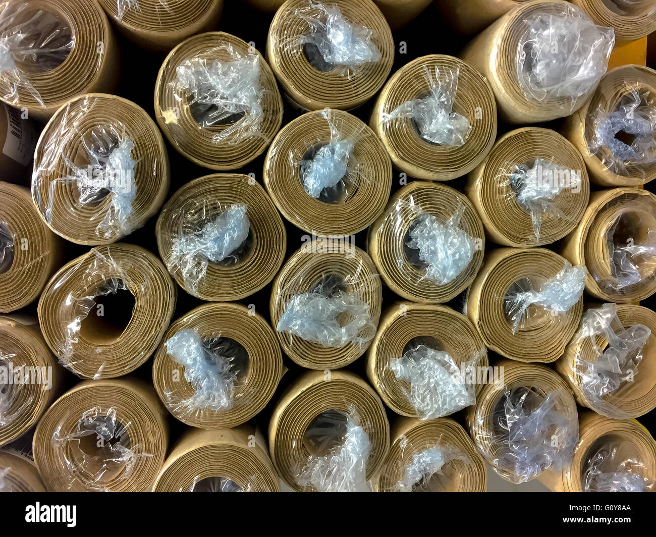 Paper roll arranged Stock Photo - Alamy