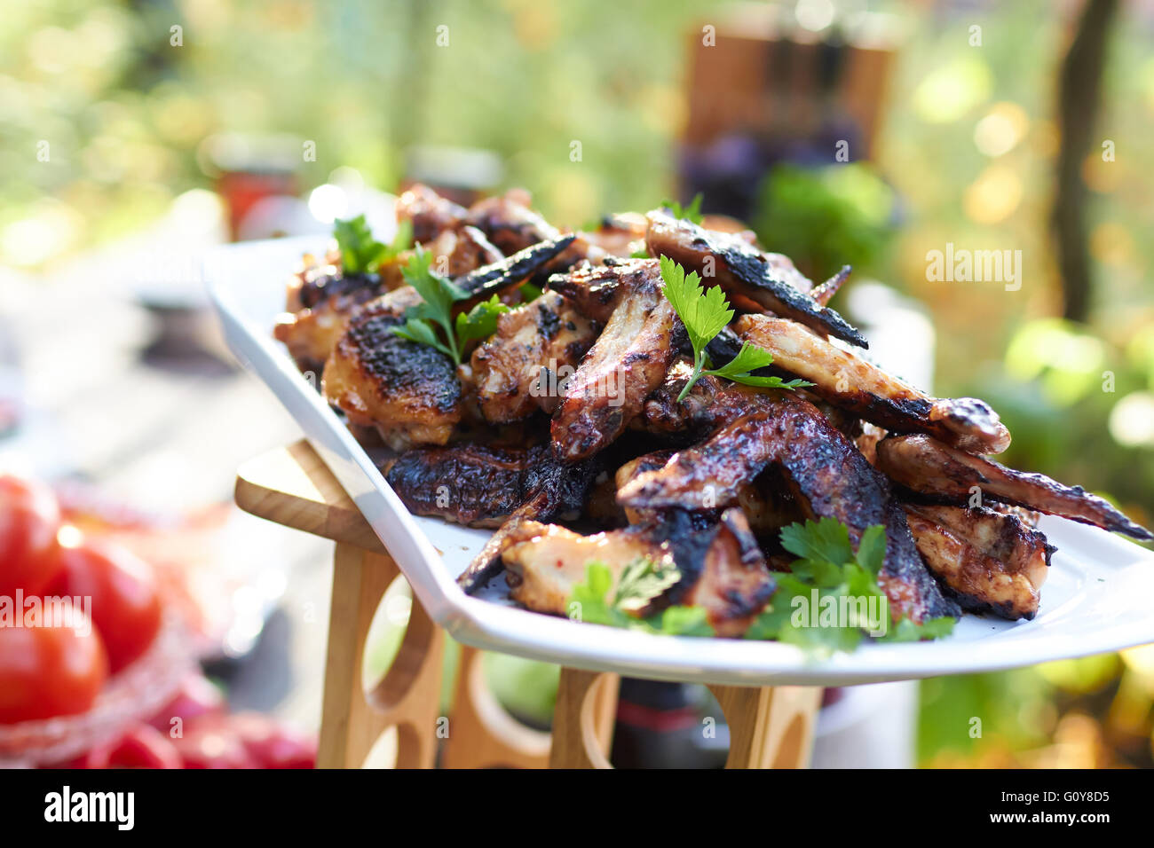 grilled chicken wings outdoor Stock Photo - Alamy