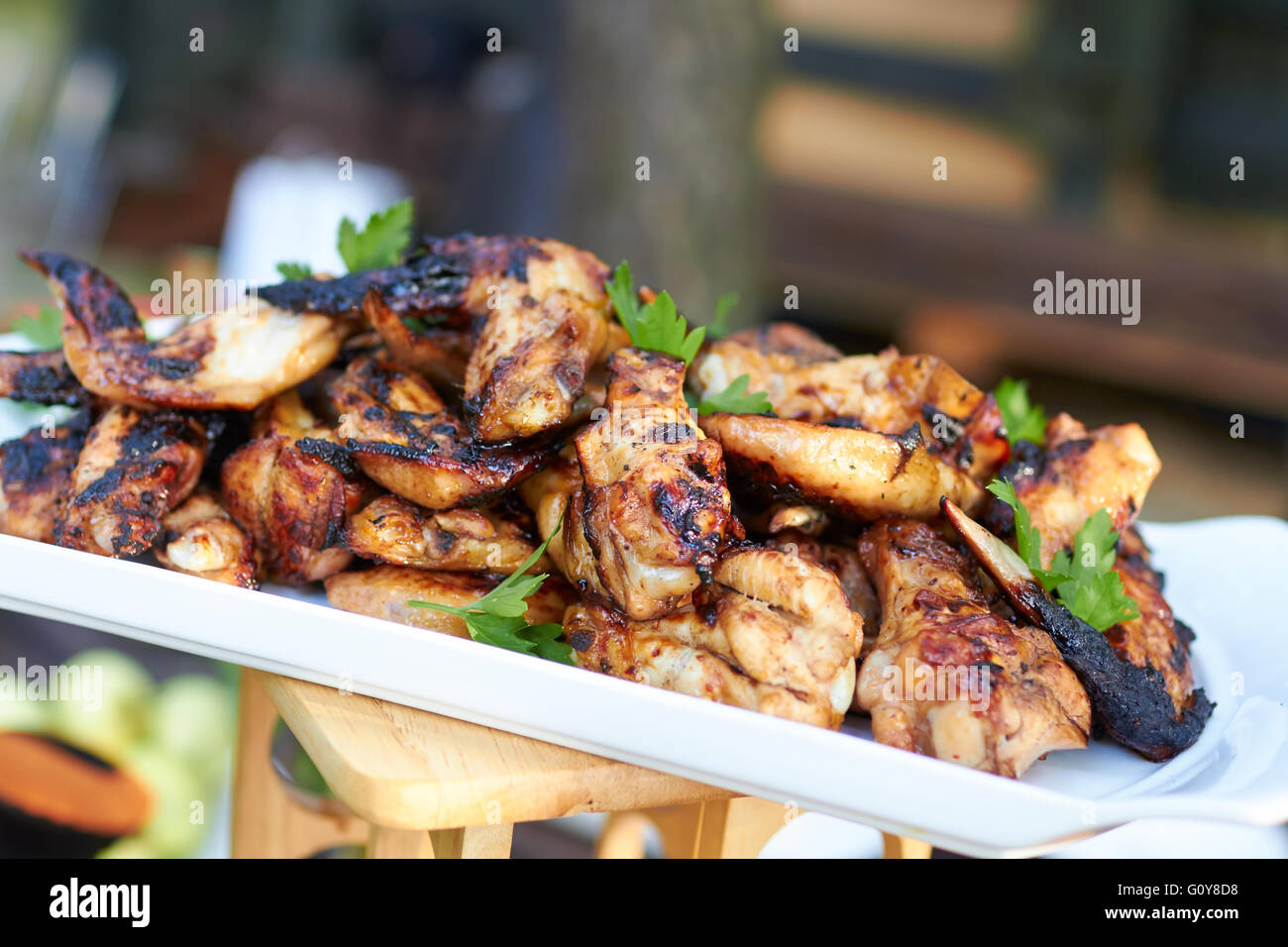 grilled chicken wings outdoor Stock Photo - Alamy