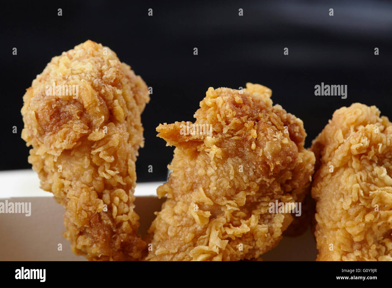 chicken legs deep fried Stock Photo - Alamy