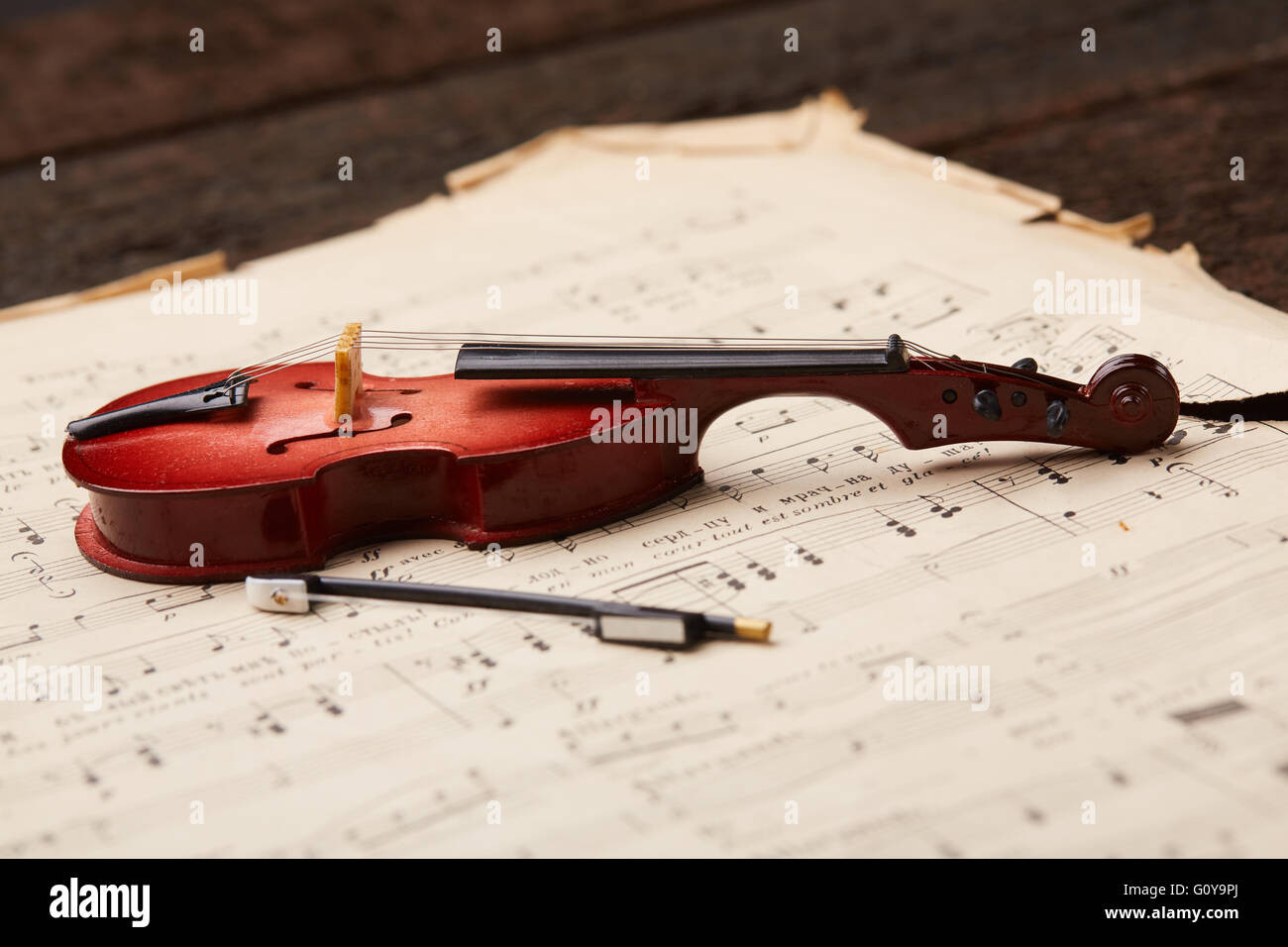 violoncello on of notes background Stock Photo - Alamy