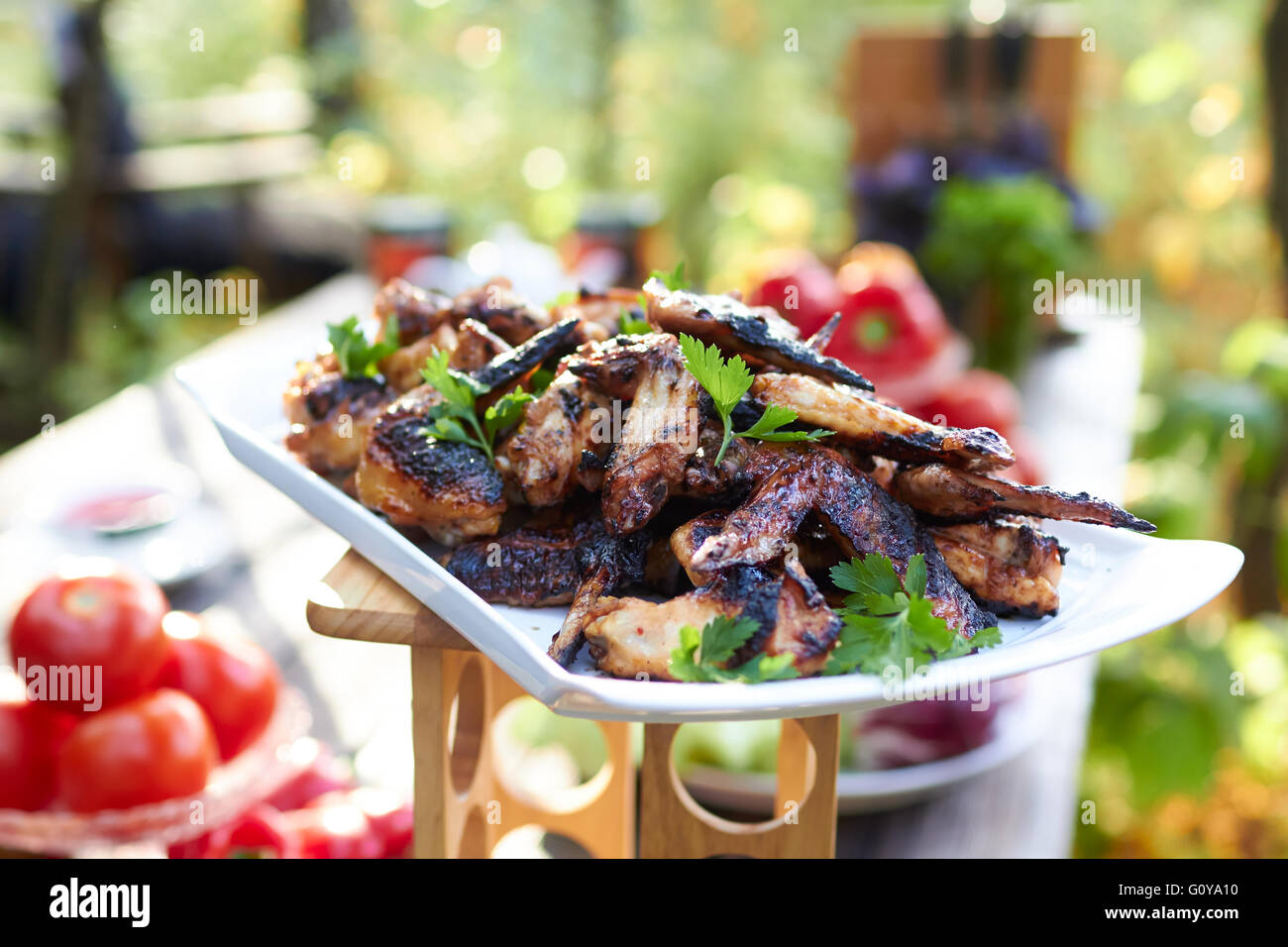 grilled chicken wings outdoor Stock Photo - Alamy