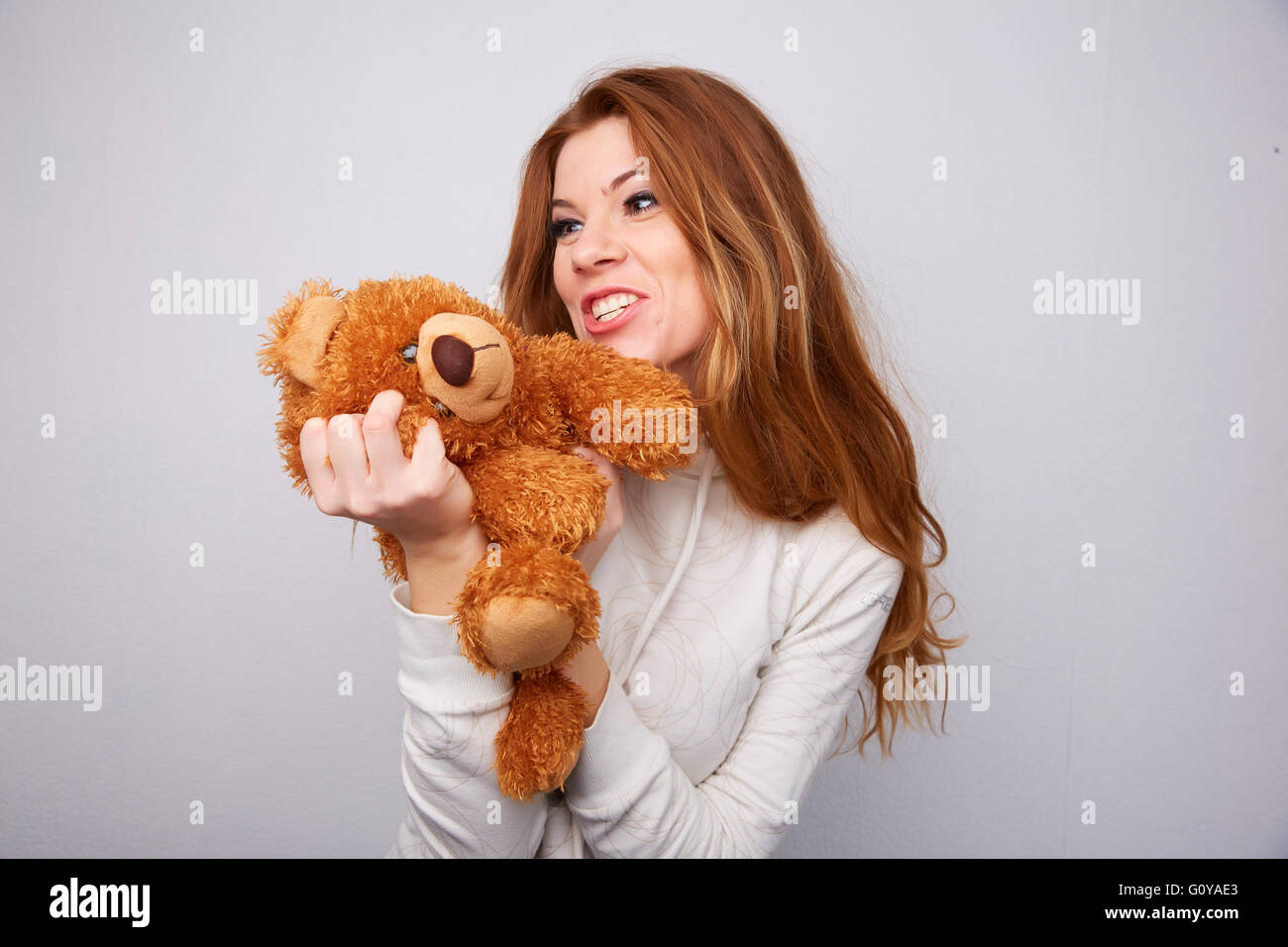 girl breaks teddy bear Stock Photo - Alamy