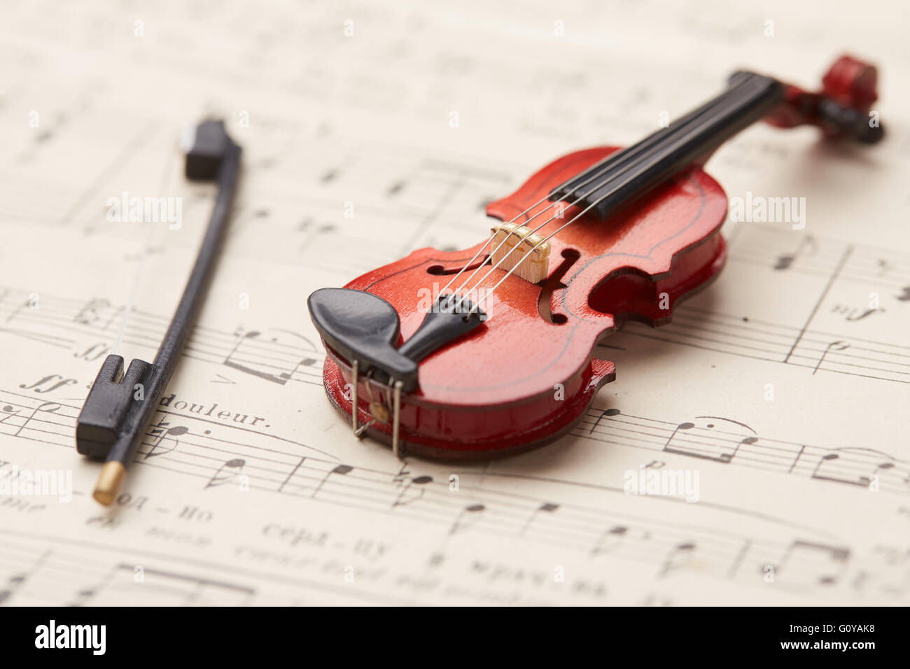 violin on of notes background Stock Photo - Alamy