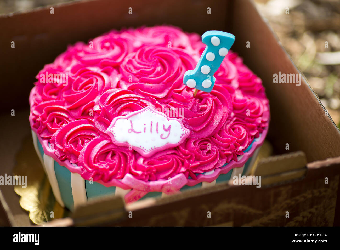 cake smash pink cake with blue and white stripes Stock Photo - Alamy