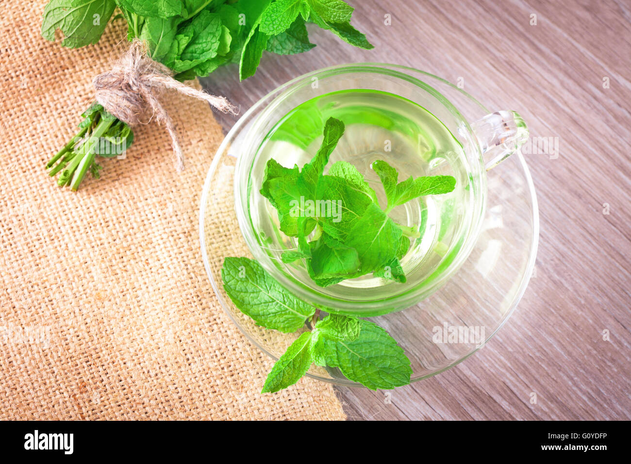 Mint tea in a transparent glass cup on the table Stock Photo - Alamy