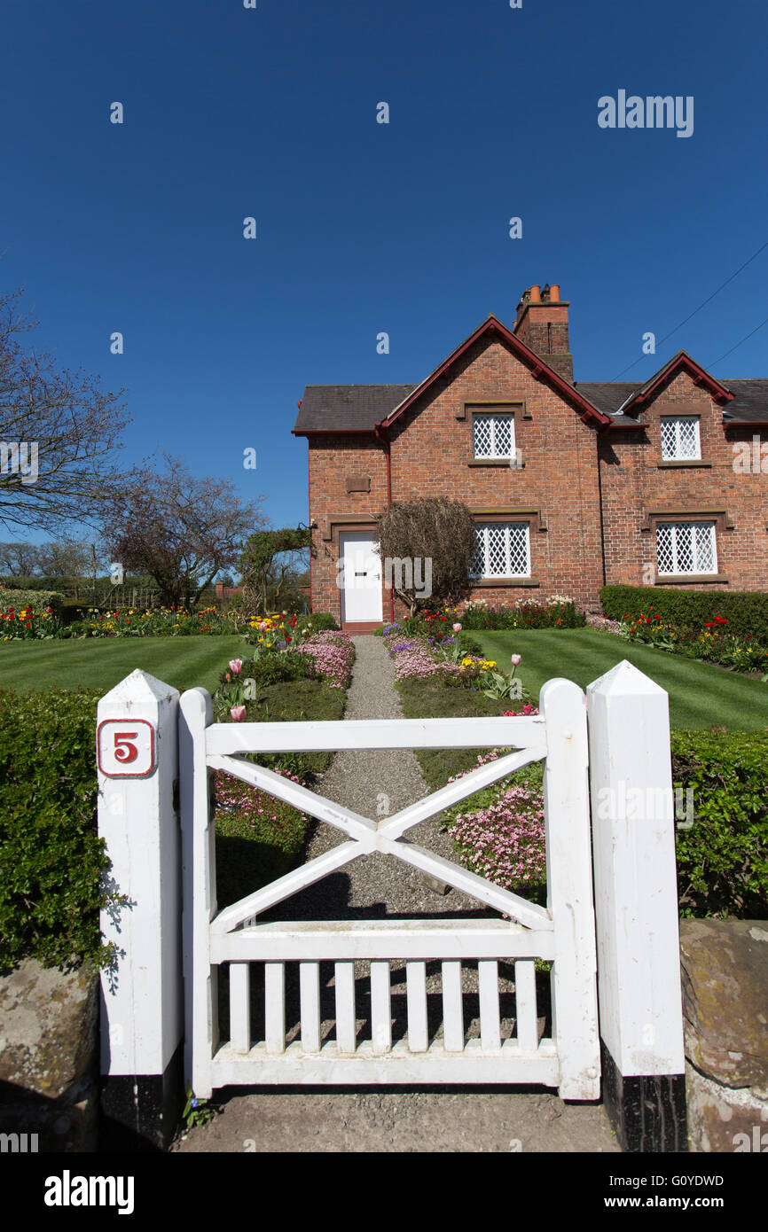Village of Aldford, England. Picturesque spring view of an Eaton Estate ...