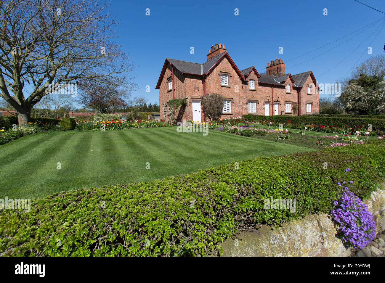 Village of Aldford, England. Picturesque spring view of an Eaton Estate ...
