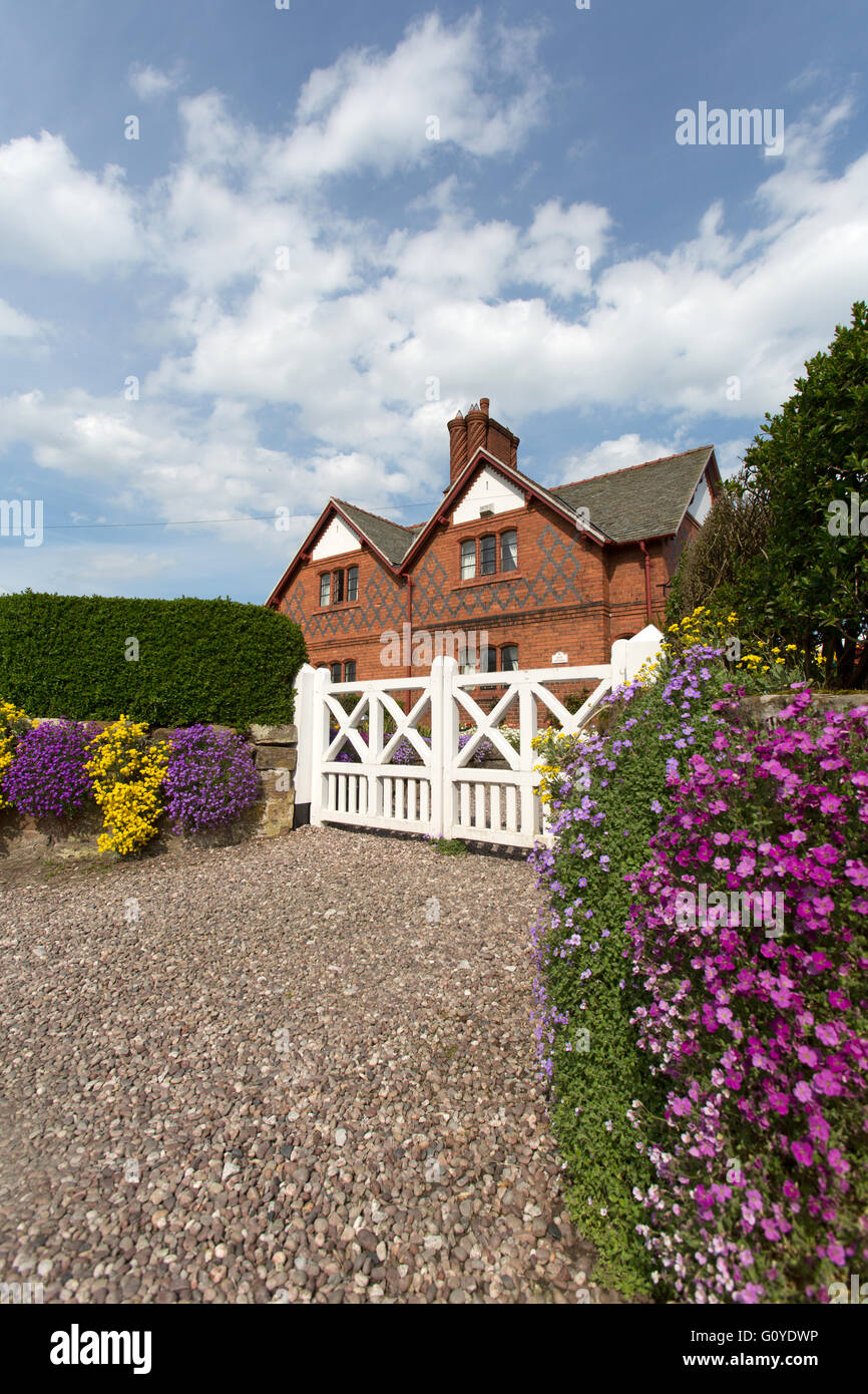Village of Aldford, England. Picturesque spring view of an Eaton Estate ...