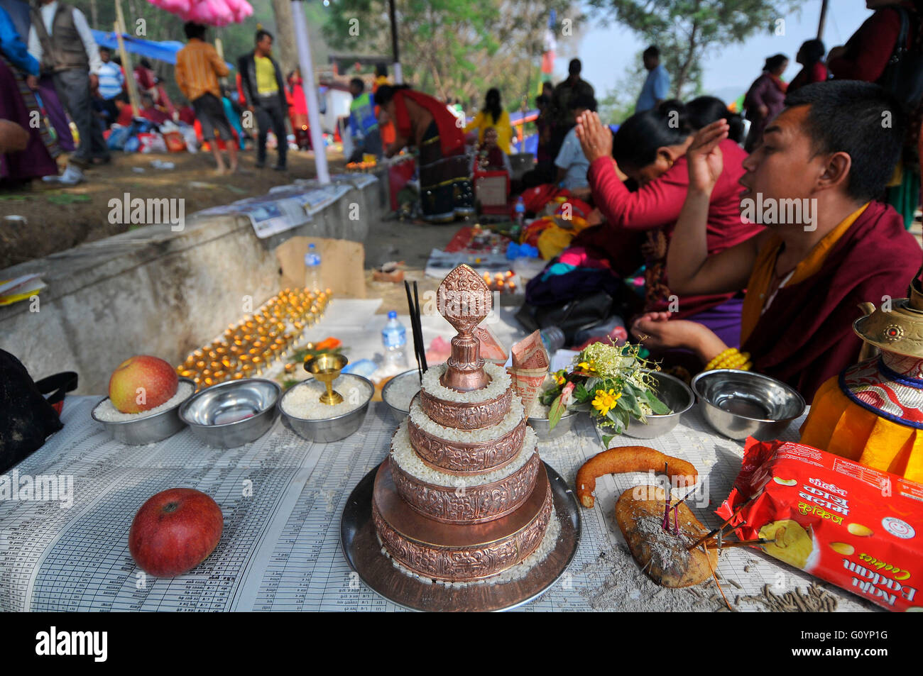 Devotees performing religious rituals at the premise of temple during ...