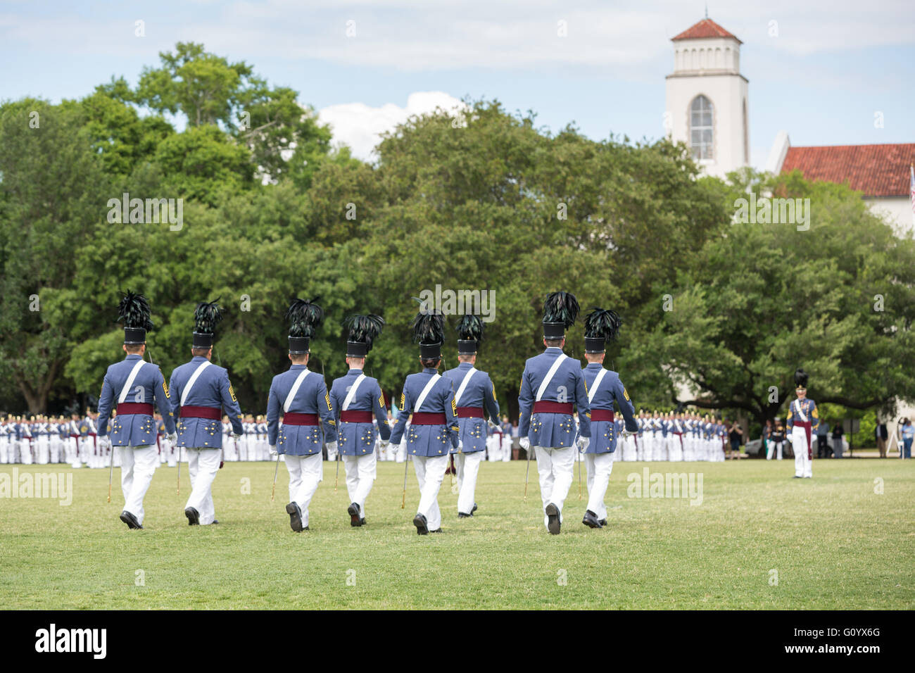 Graduating senior cadets in formal dress uniform march onto the parade ...