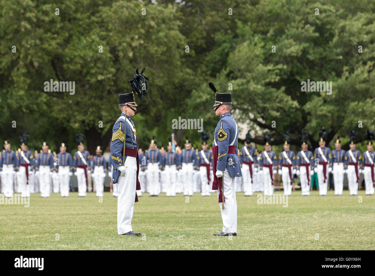Graduating senior cadet leader prepares to hand over his sword to his ...