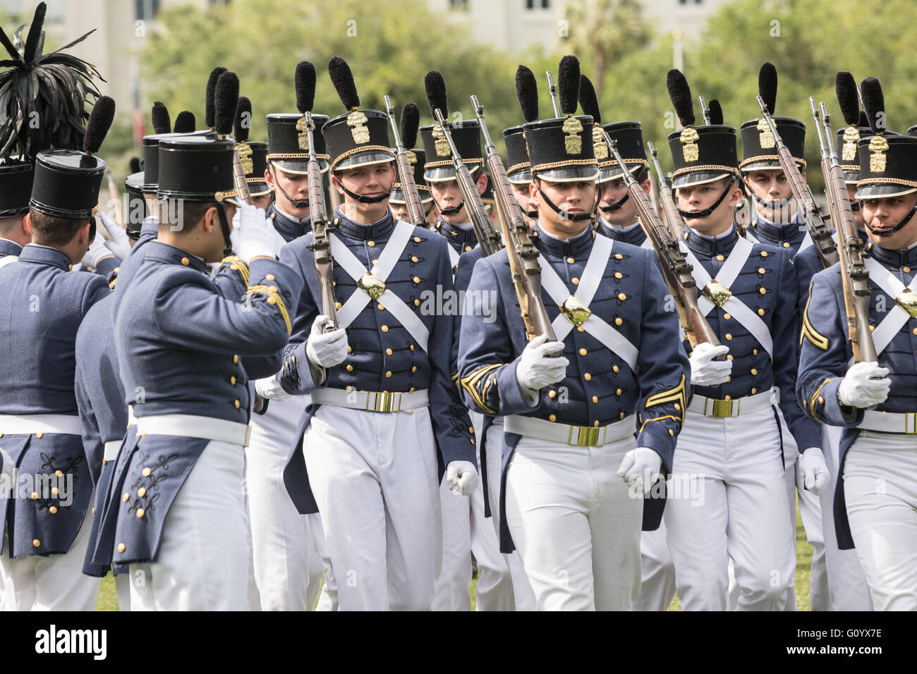 Graduating senior cadets salute underclassmen parade past in their ...