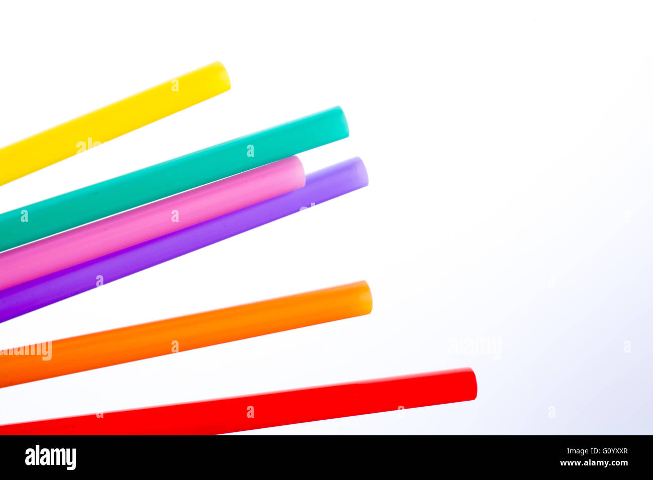 different color of straw on a white background Stock Photo - Alamy