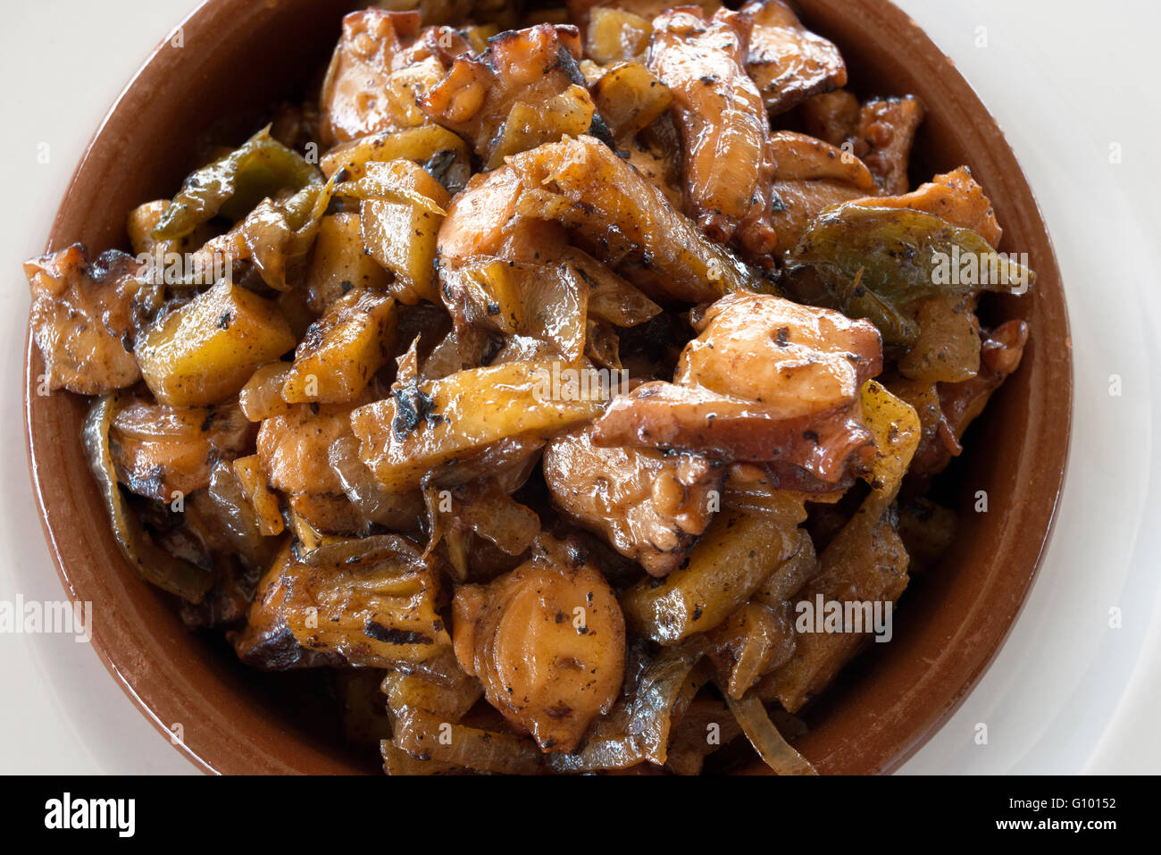 Fried octopus (Sauteed octopus with a fried potato, pepper, onion and ...