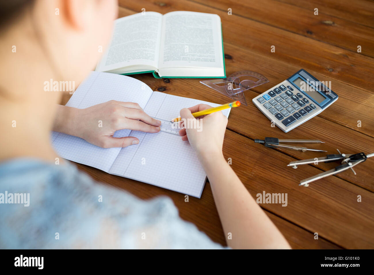 close up of hands with ruler and pencil drawing Stock Photo - Alamy