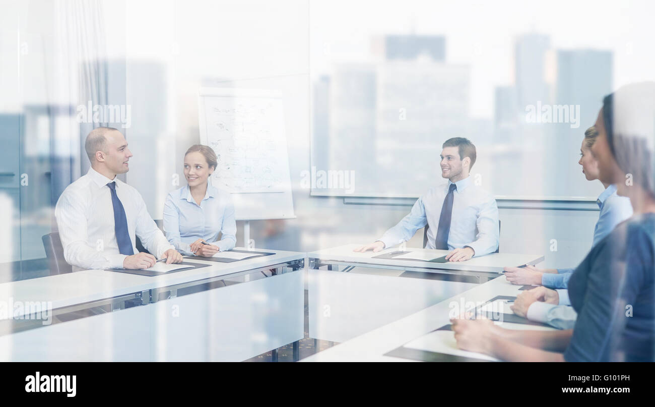 group of smiling businesspeople meeting in office Stock Photo - Alamy