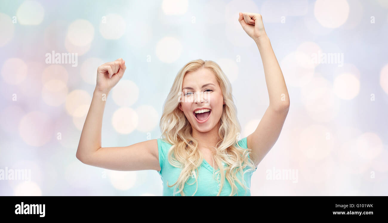 happy young woman or teen girl celebrating victory Stock Photo - Alamy