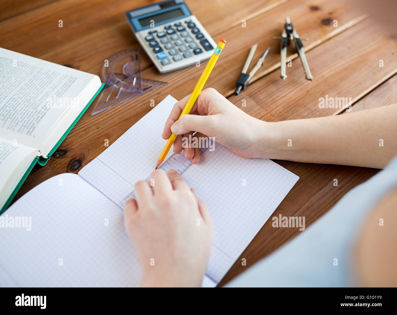 close up of hands with ruler and pencil drawing Stock Photo - Alamy