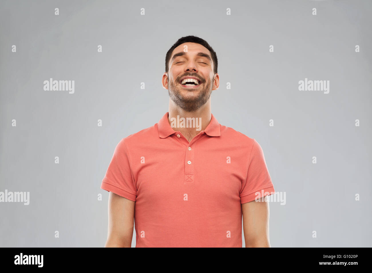 laughing man over gray background Stock Photo - Alamy
