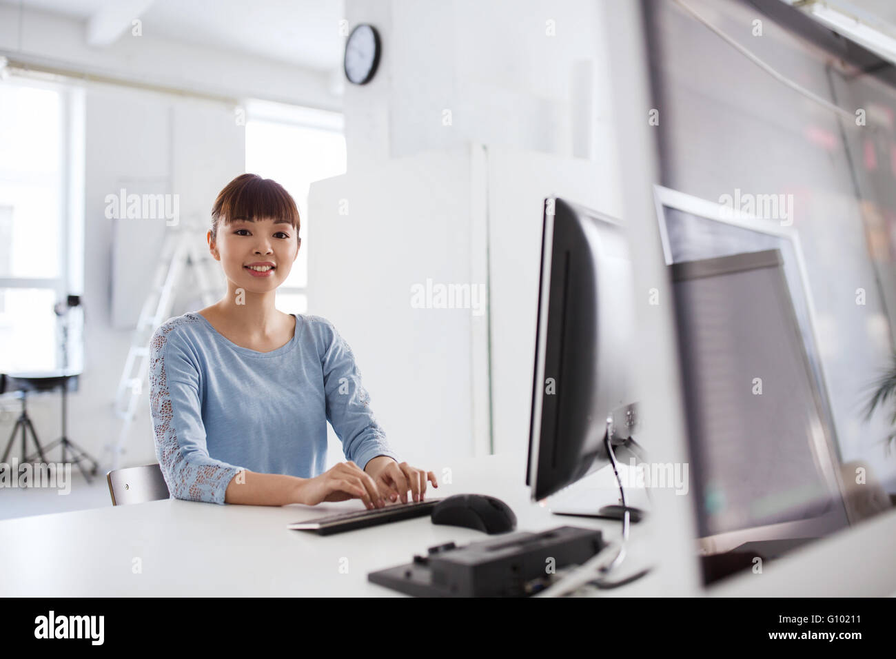 happy asian woman with computer at office Stock Photo - Alamy