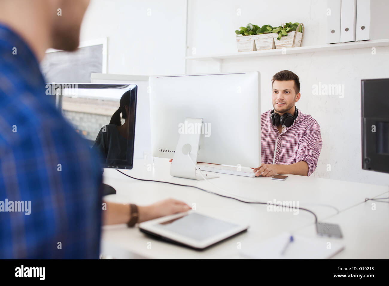 creative man with headphones and computer Stock Photo - Alamy