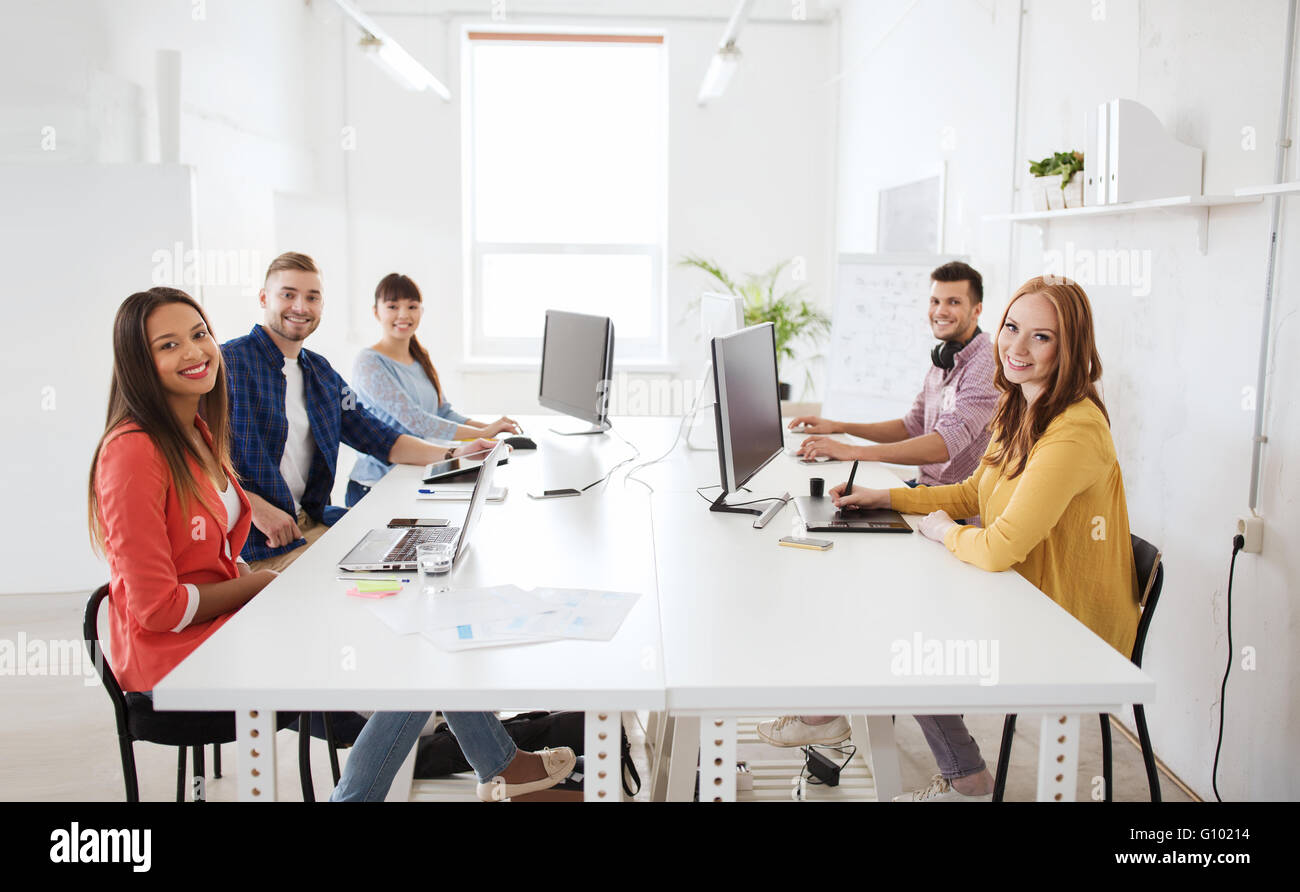 creative team with computers, blueprint at office Stock Photo - Alamy
