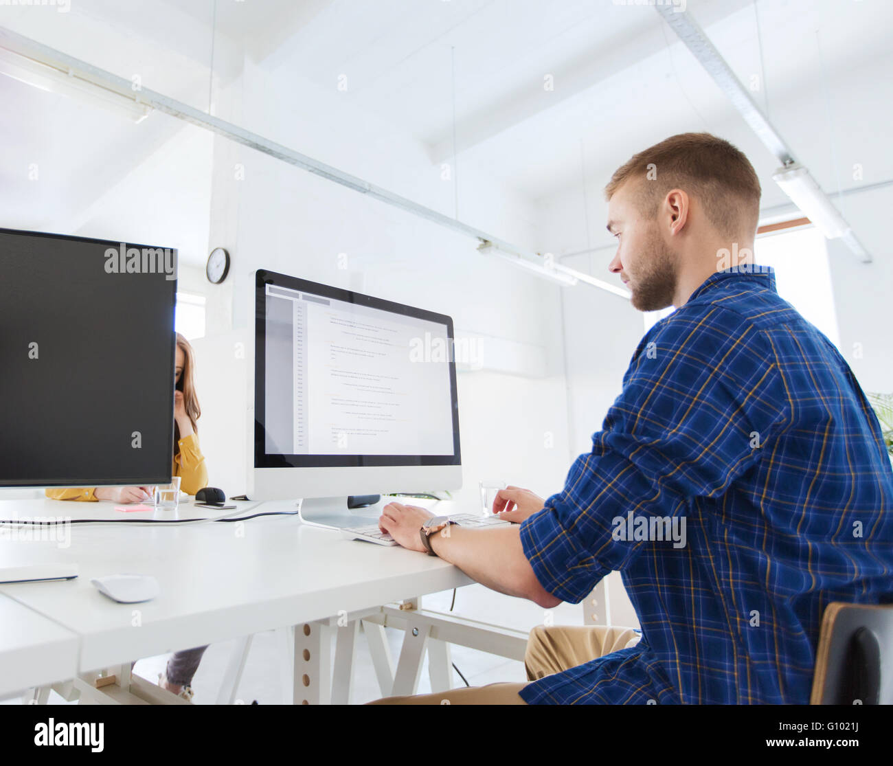 creative man or programmer with computer at office Stock Photo - Alamy